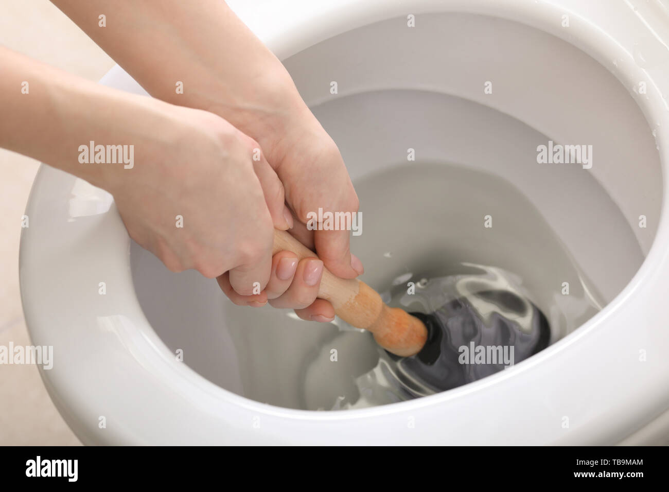Woman Flush Toilet High Resolution Stock Photography and Images - Alamy