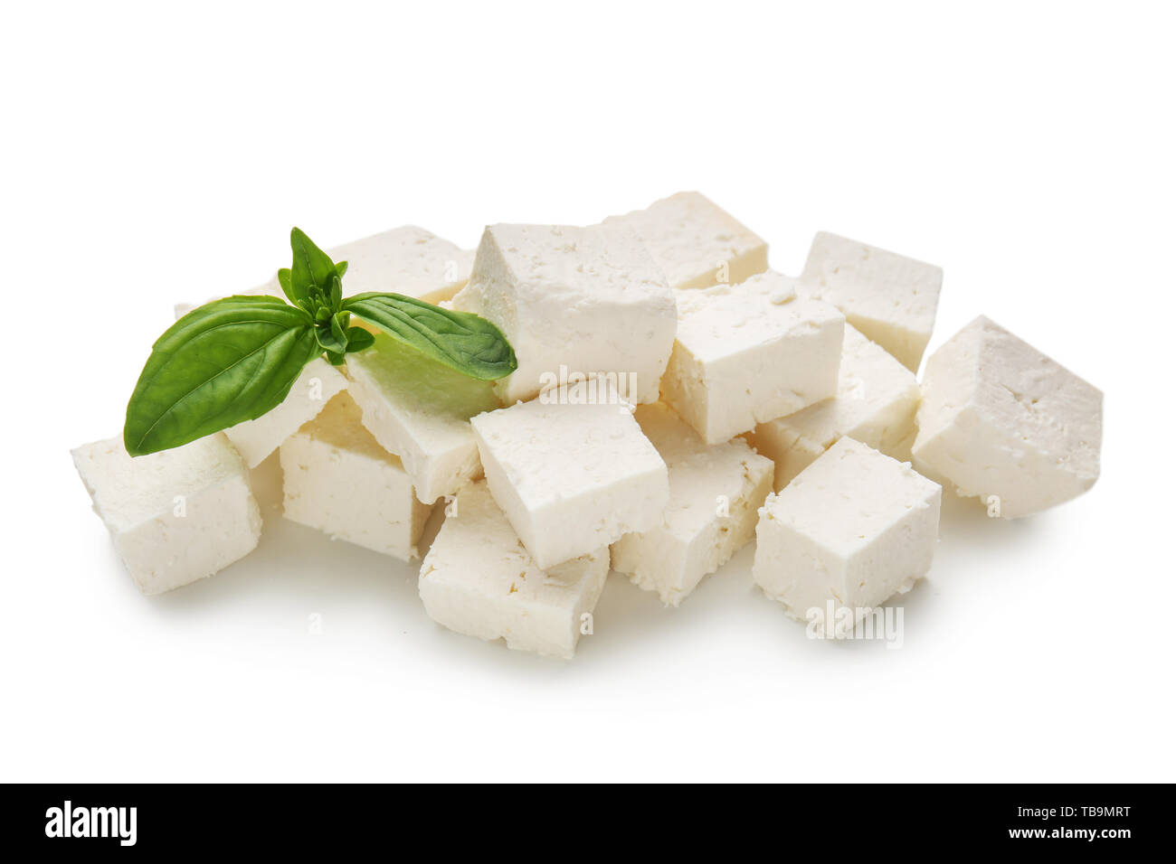 Pieces of tasty feta cheese on white background Stock Photo - Alamy