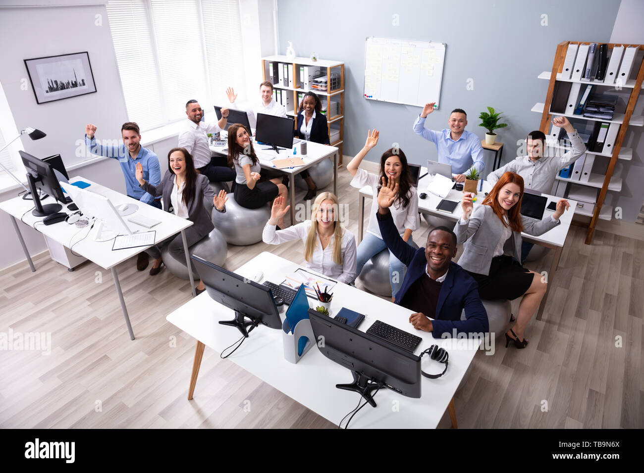 Office man waving hand hi-res stock photography and images - Alamy