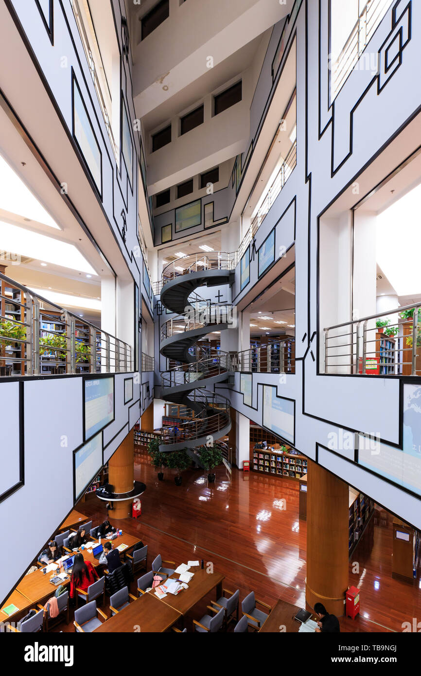 The inner lobby of the library and the rotating staircase Stock Photo ...
