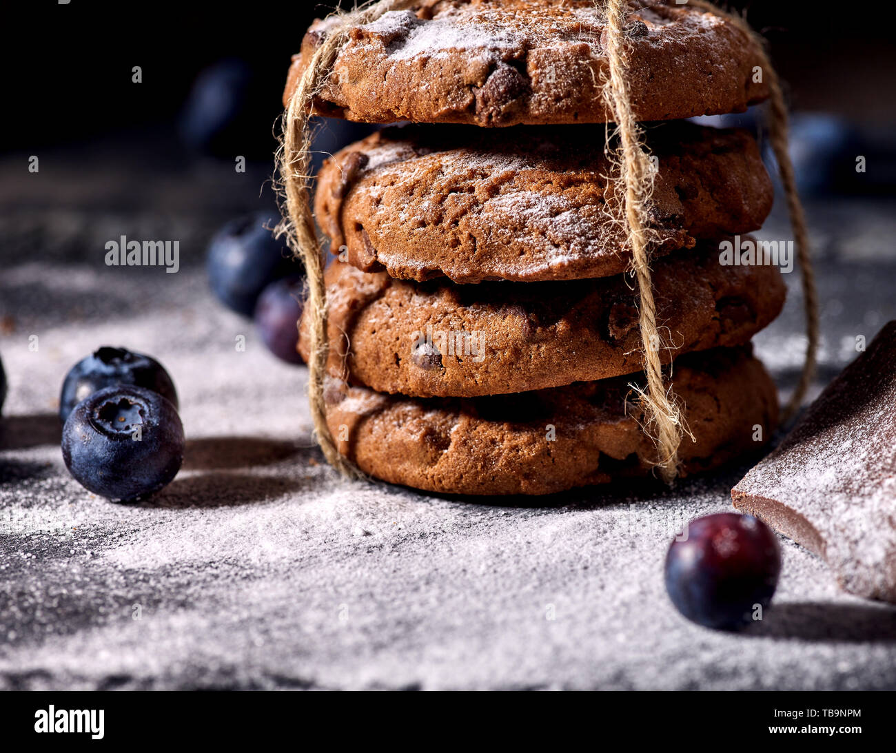 Chocolate chip cookies tied with string. Serving food on slate Stock ...