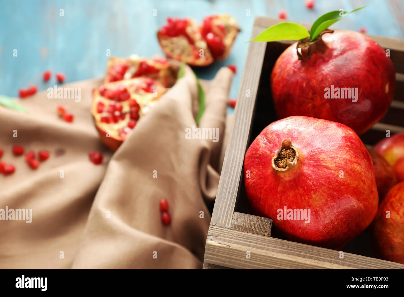Pomegranate in wooden box hi-res stock photography and images - Alamy