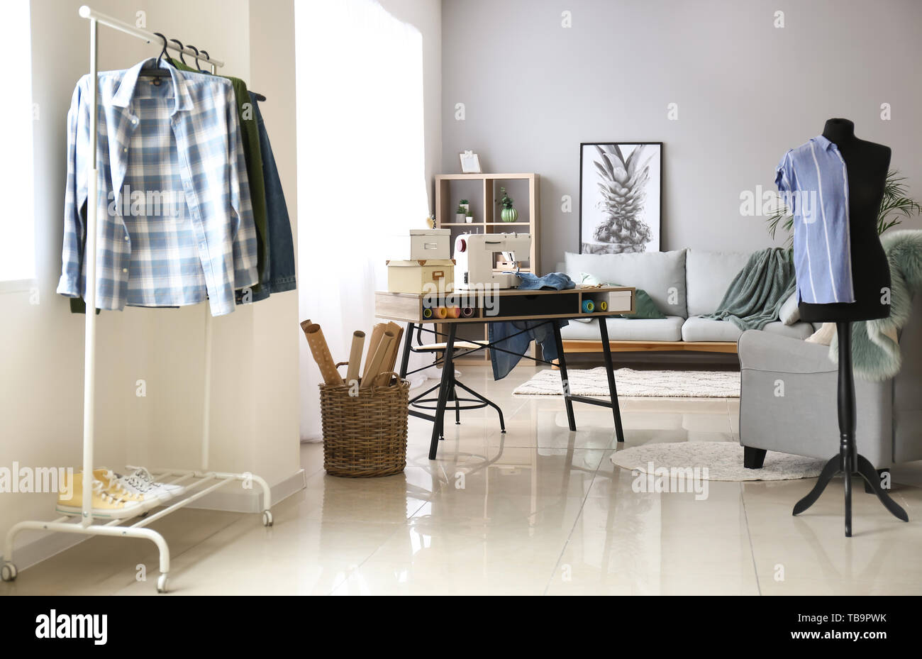 Stylish workplace of tailor with sewing machine in workshop Stock Photo ...