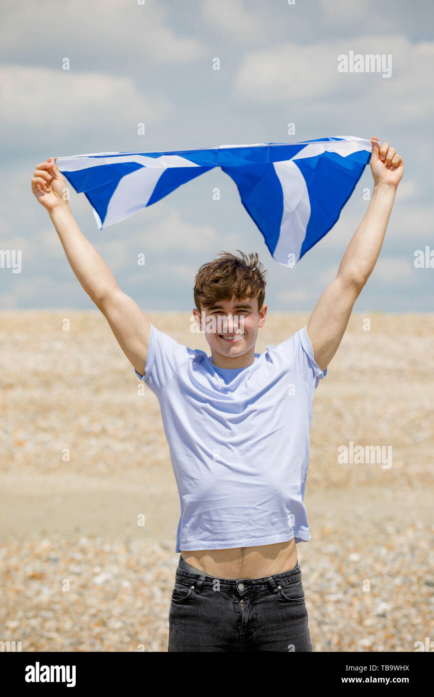 Man holding scottish flag hi-res stock photography and images - Alamy