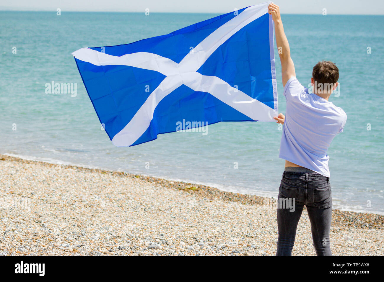 Man Holding Scottish Flag High Resolution Stock Photography and Images ...