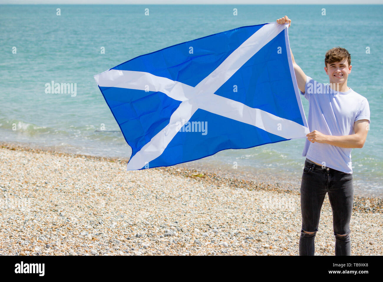 Man Holding Scottish Flag High Resolution Stock Photography and Images ...