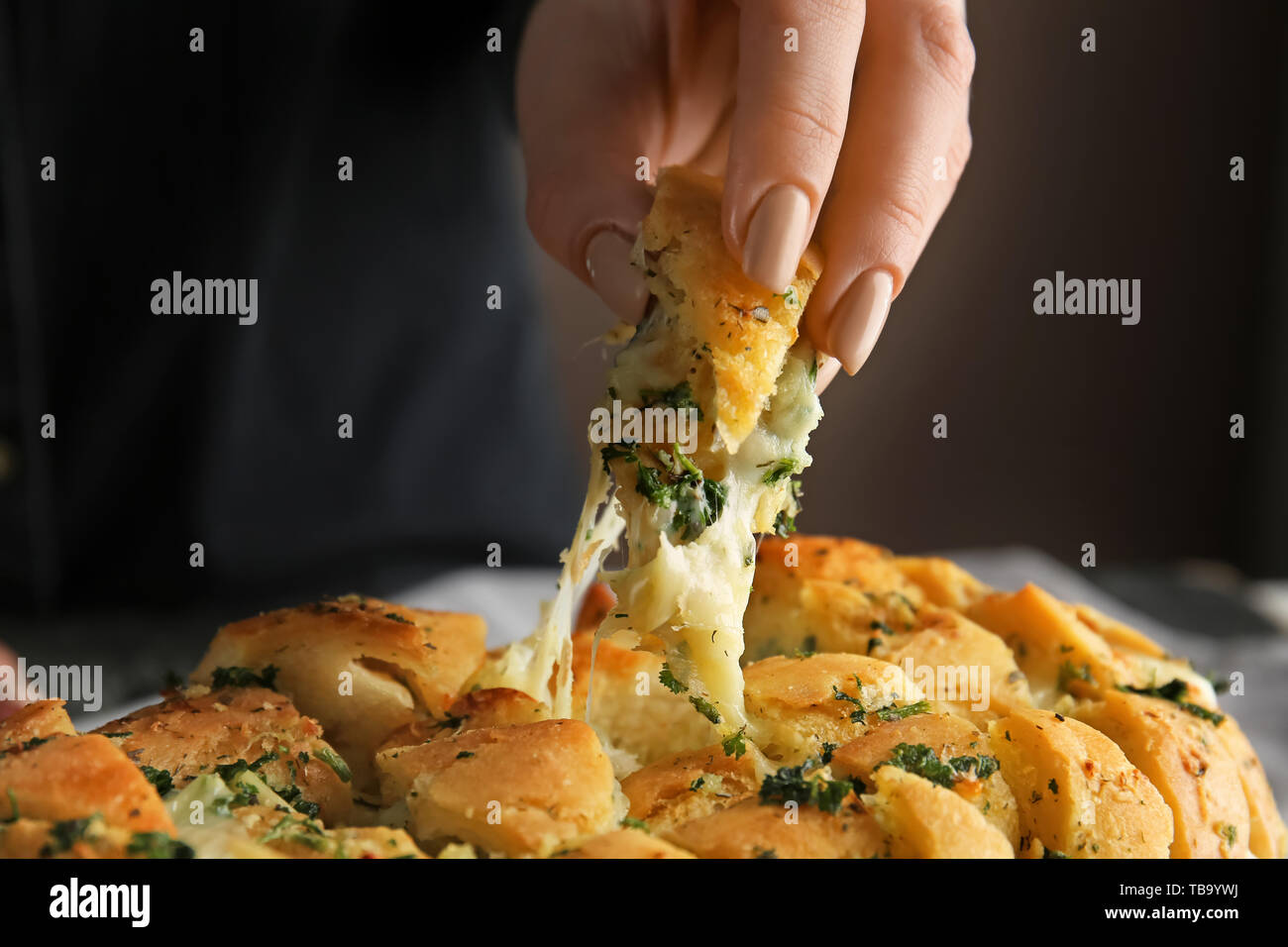 Woman hand taking garlic hi-res stock photography and images - Alamy
