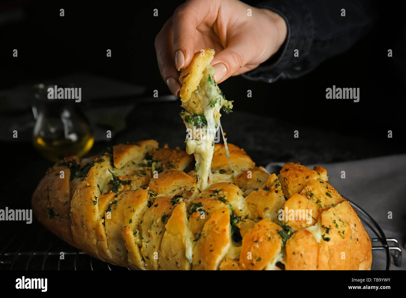 Woman hand taking garlic hi-res stock photography and images - Alamy