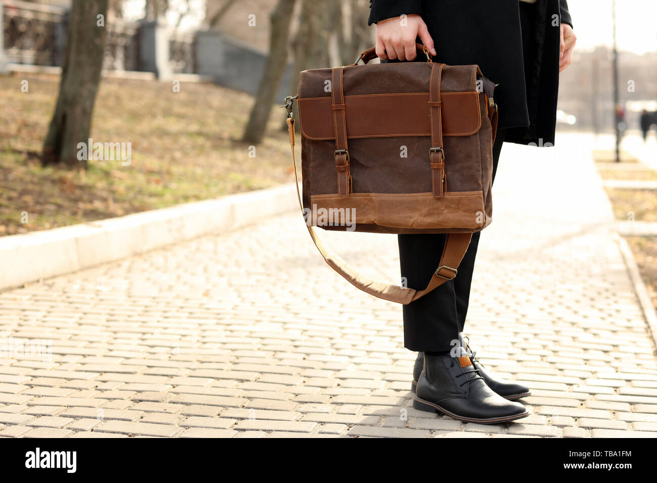 Legs businessman holding briefcase hi-res stock photography and images ...