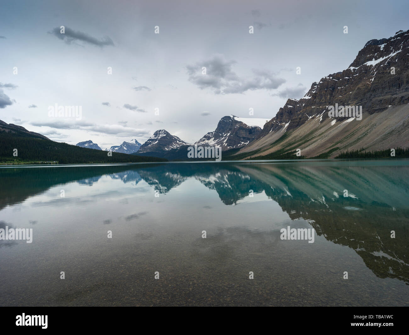Reflection of mountains in Bow Lake, Banff National Park, Jasper ...