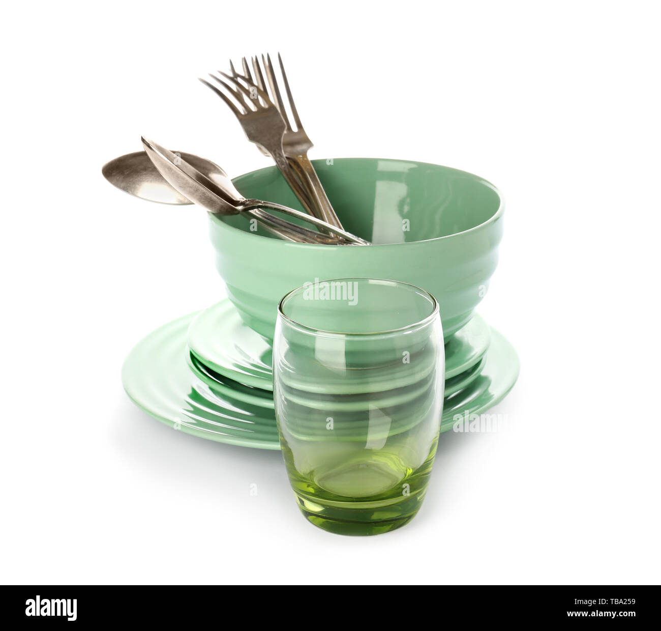 Set of clean tableware on white background Stock Photo - Alamy