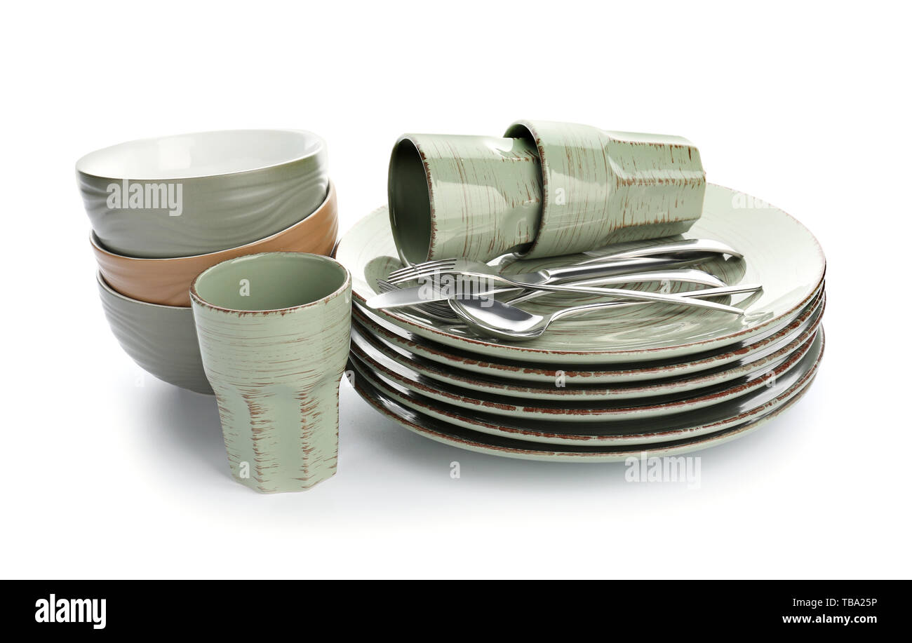 Set of clean tableware on white background Stock Photo - Alamy