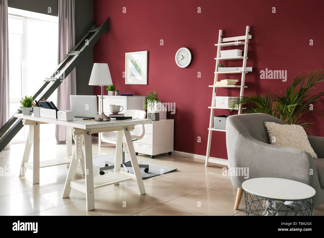 Interior of modern room with stylish workplace Stock Photo - Alamy
