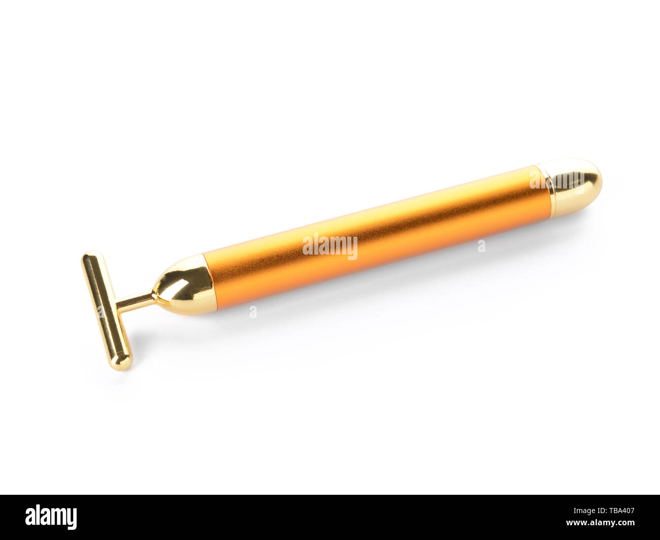 Facial massage tool on white background Stock Photo - Alamy