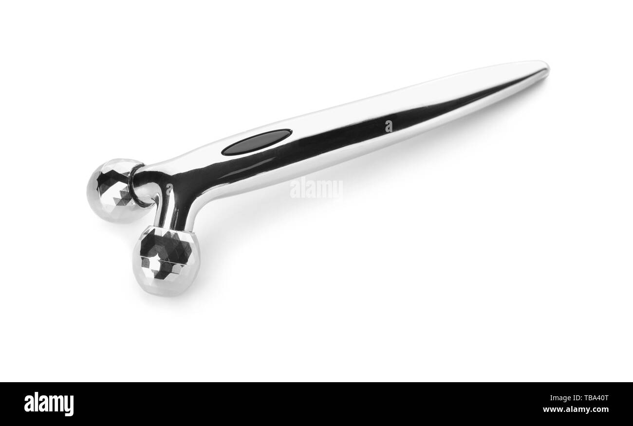 Facial massage tool on white background Stock Photo - Alamy