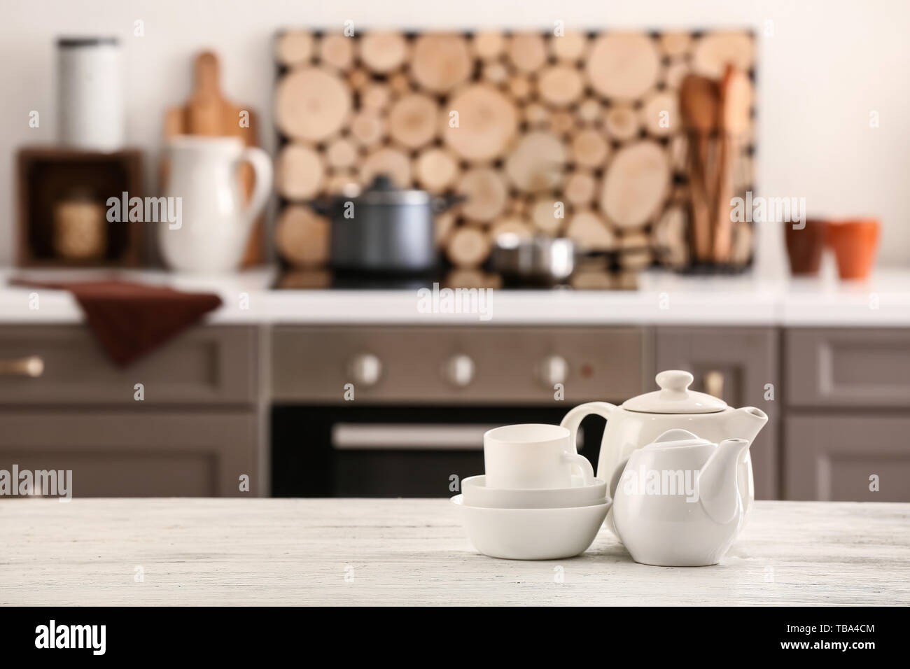 Set of tableware in modern kitchen Stock Photo - Alamy