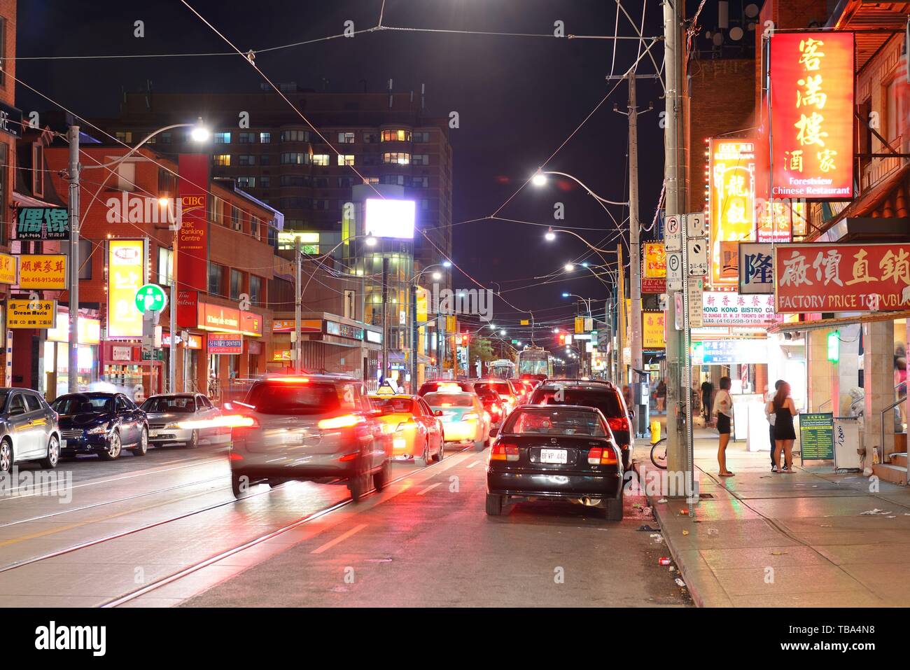 TORONTO,CANADA - JULY 2: Chinatown street view on July 2,2012 in ...