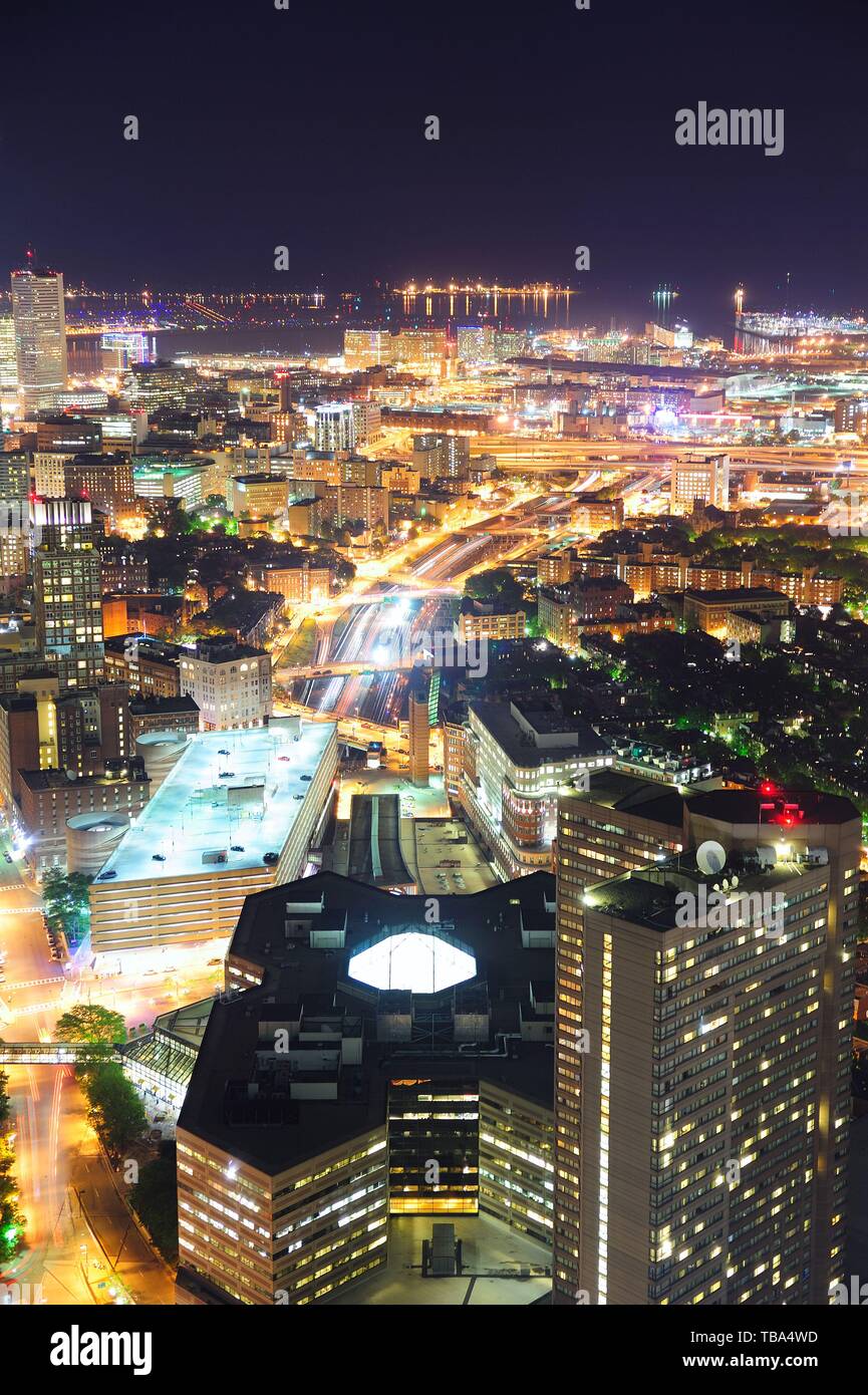 Urban city night scene. Boston aerial view with skyscrapers at night ...