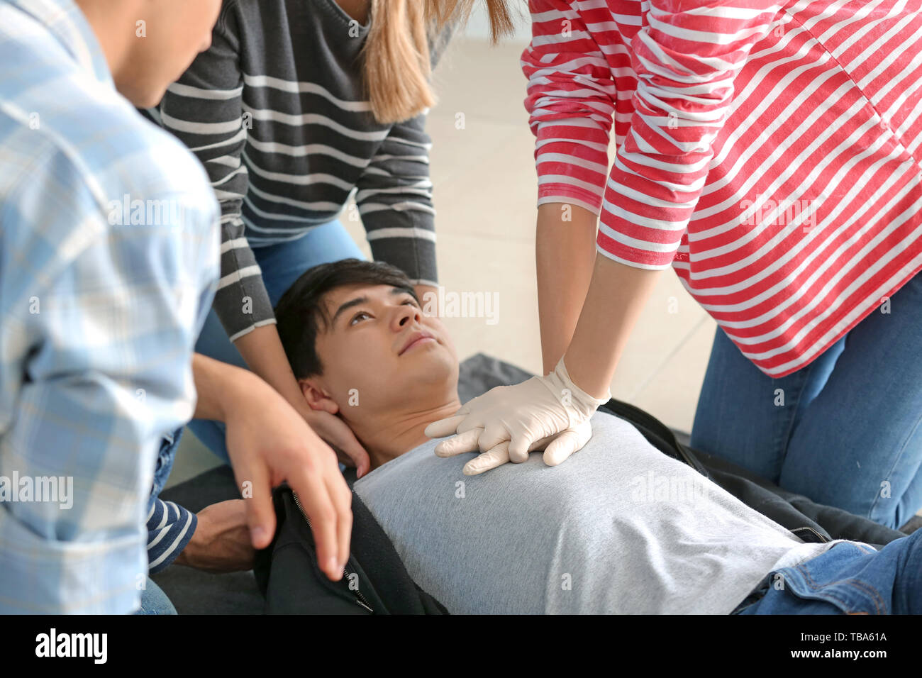 People learning to perform CPR at first aid training course Stock Photo ...