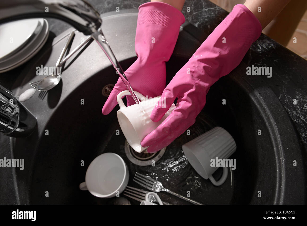 Cup in sink hi-res stock photography and images - Alamy