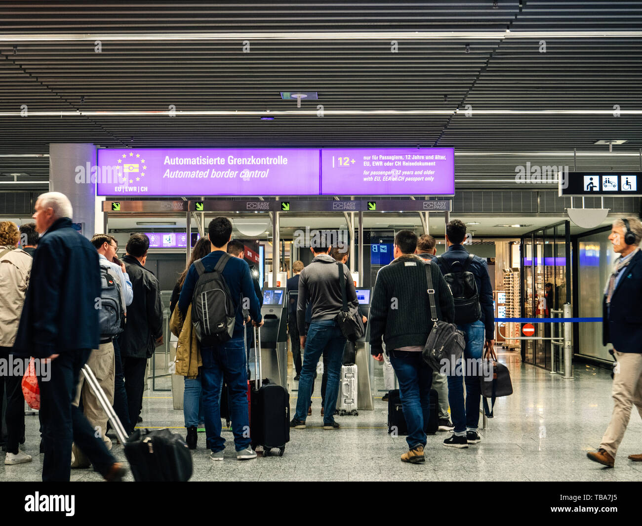 Frankfurt, Germany - Apr 29, 2019: Passengers people waiting in queue ...