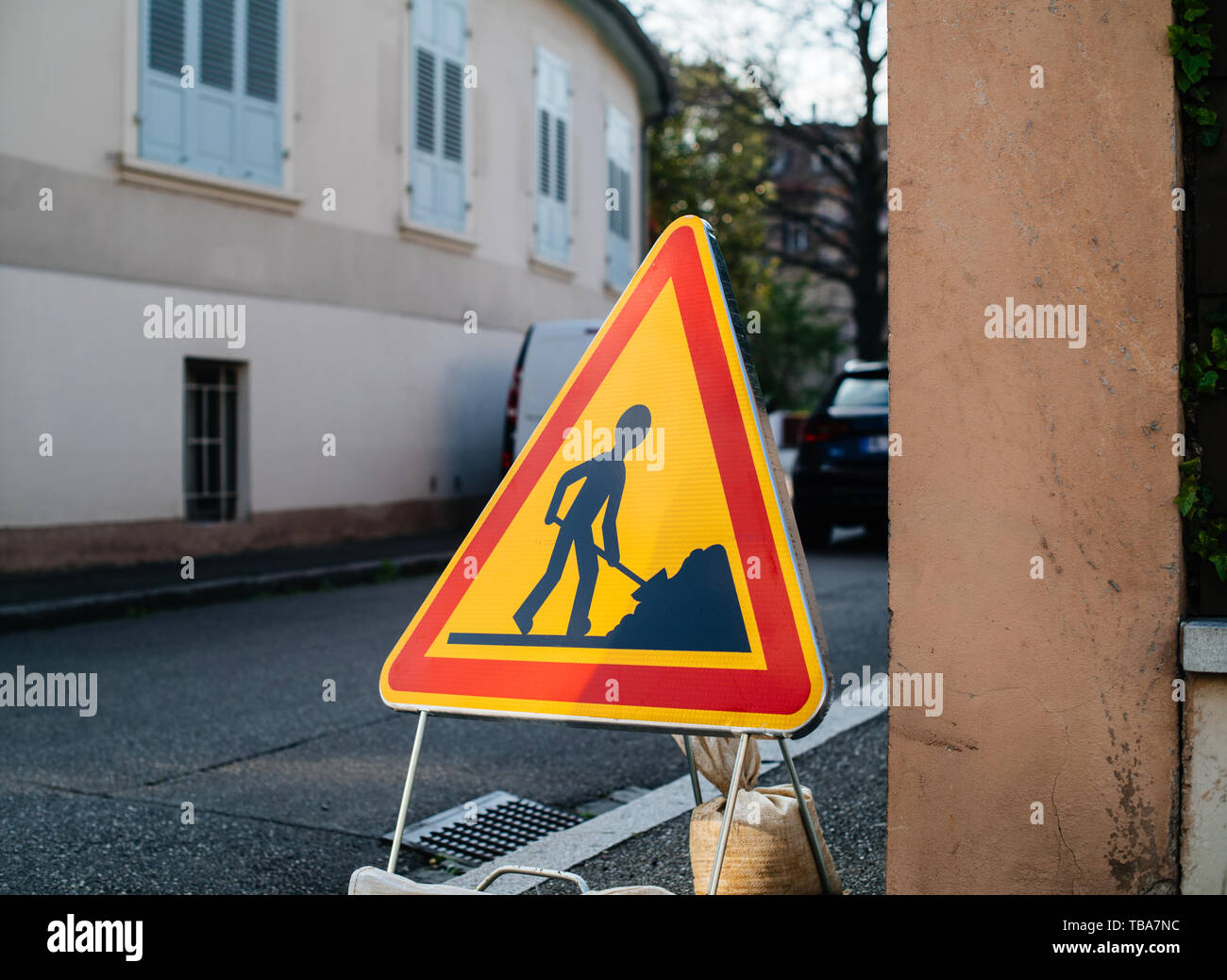 Construction roadworks warning sign ahead on French tiny street Stock ...