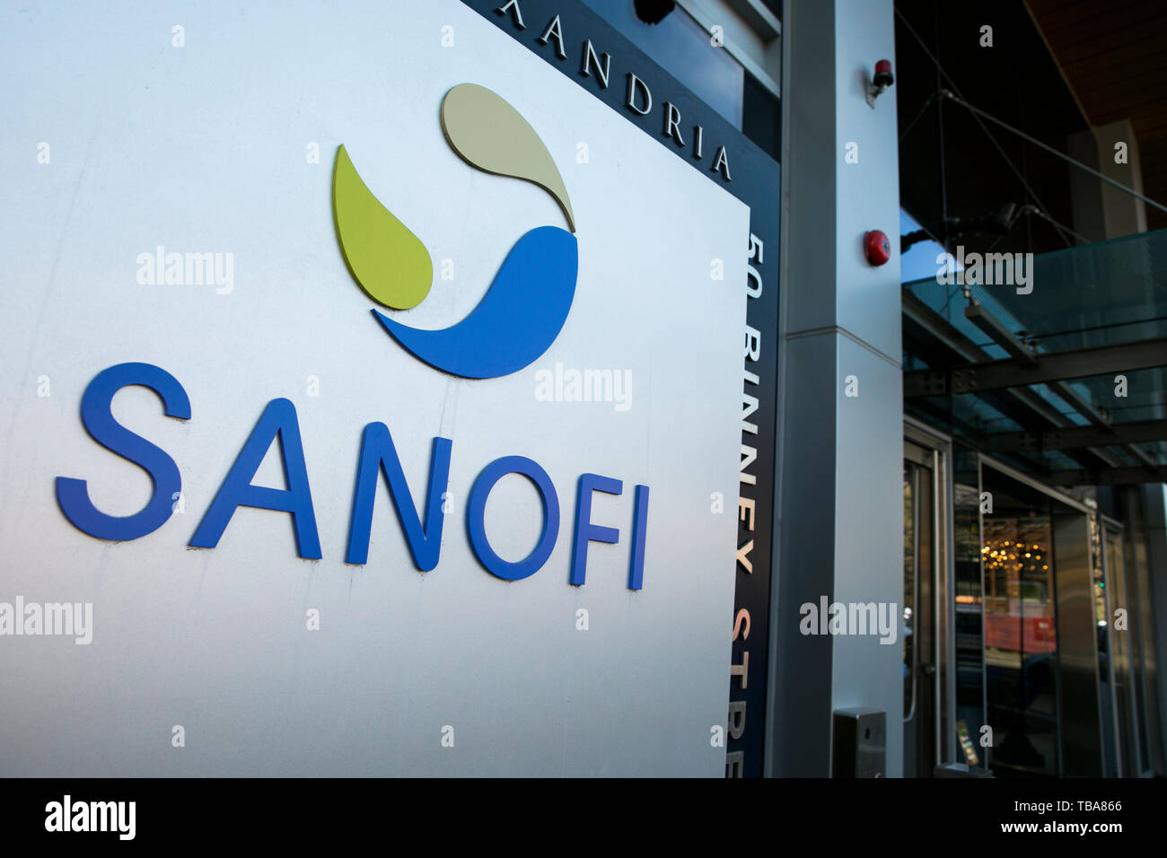 A logo sign outside of a facility occupied by Sanofi in Cambridge ...