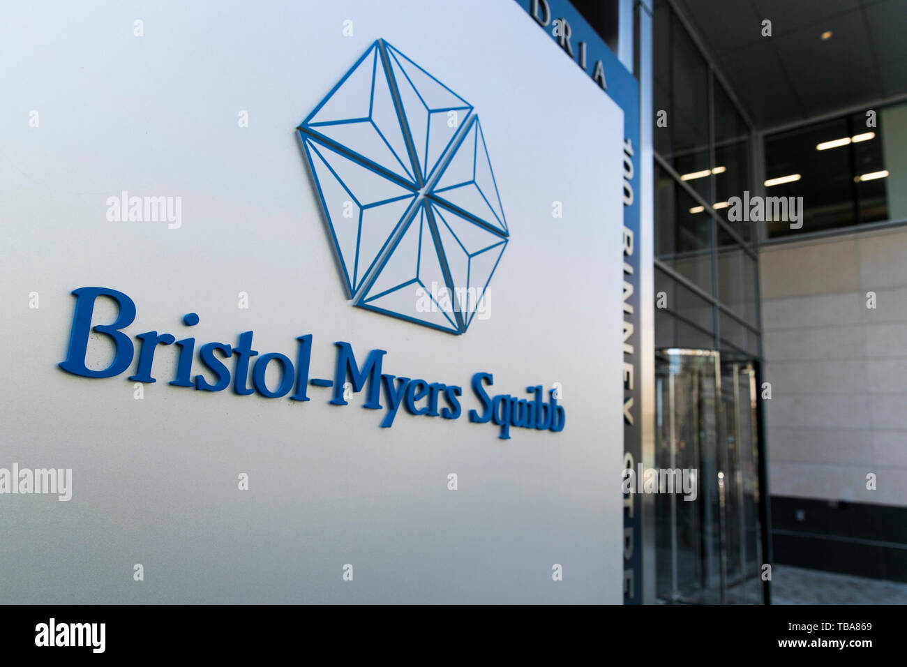 A logo sign outside of a facility occupied by Bristol-Myers Squibb in ...