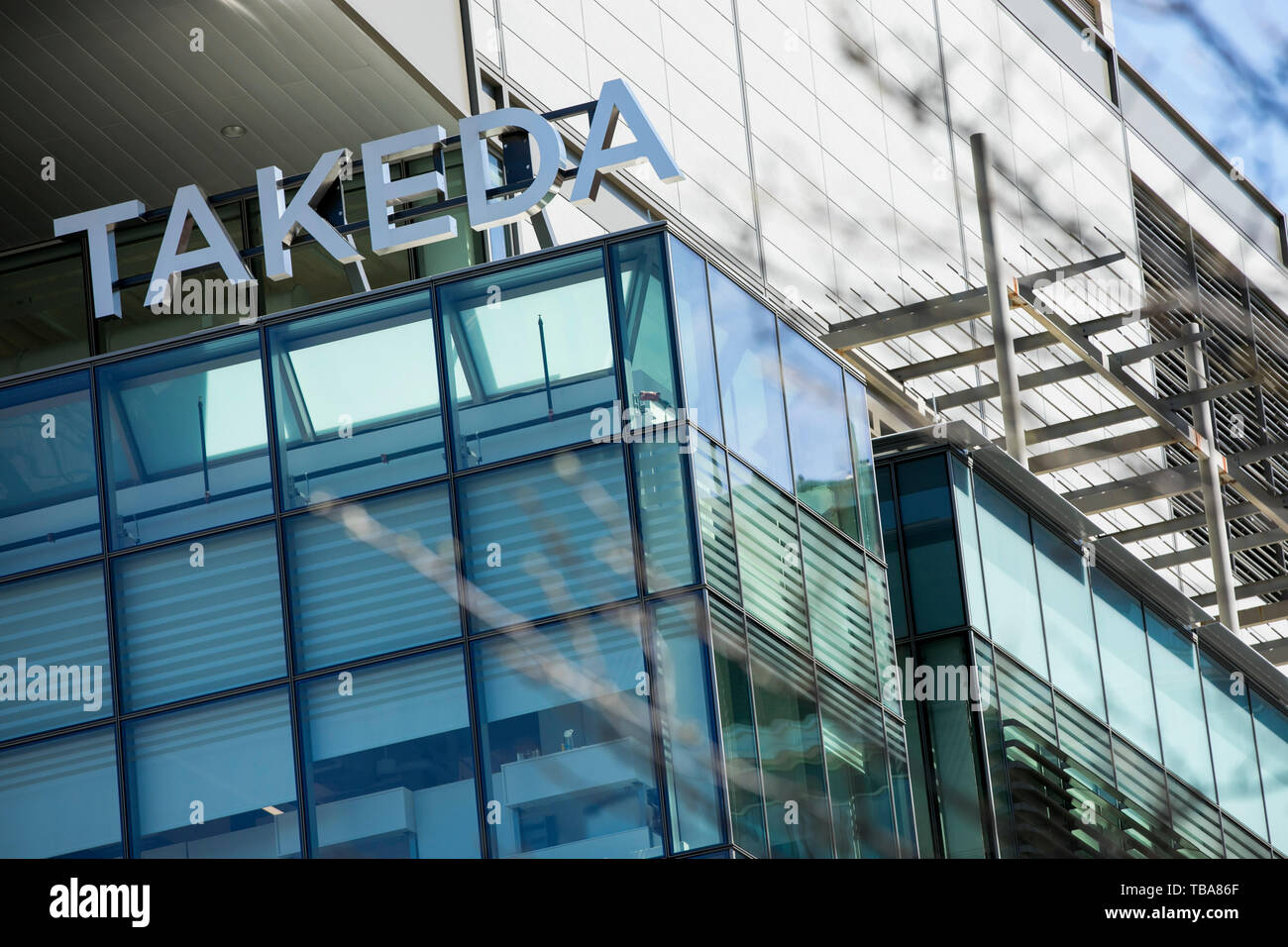 A logo sign outside of a facility occupied by the Takeda Pharmaceutical ...