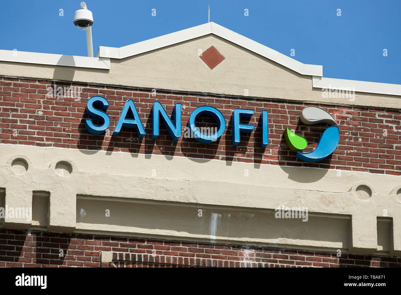 A logo sign outside of a facility occupied by Sanofi in Cambridge ...