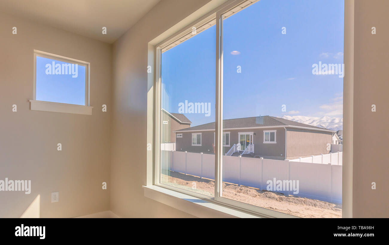 frame Panorama Room of a new house with a large window overlooking ...