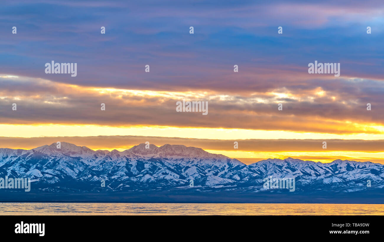 frame Panorama Panoramic view of a shiny lake and mountain covered with ...