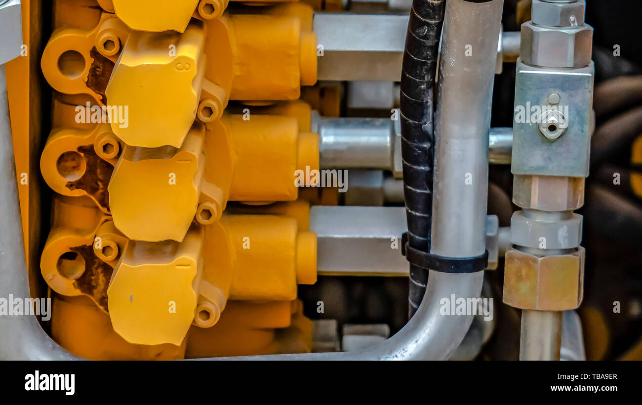 frame Panorama Details of a yellow construction machinery with close up ...