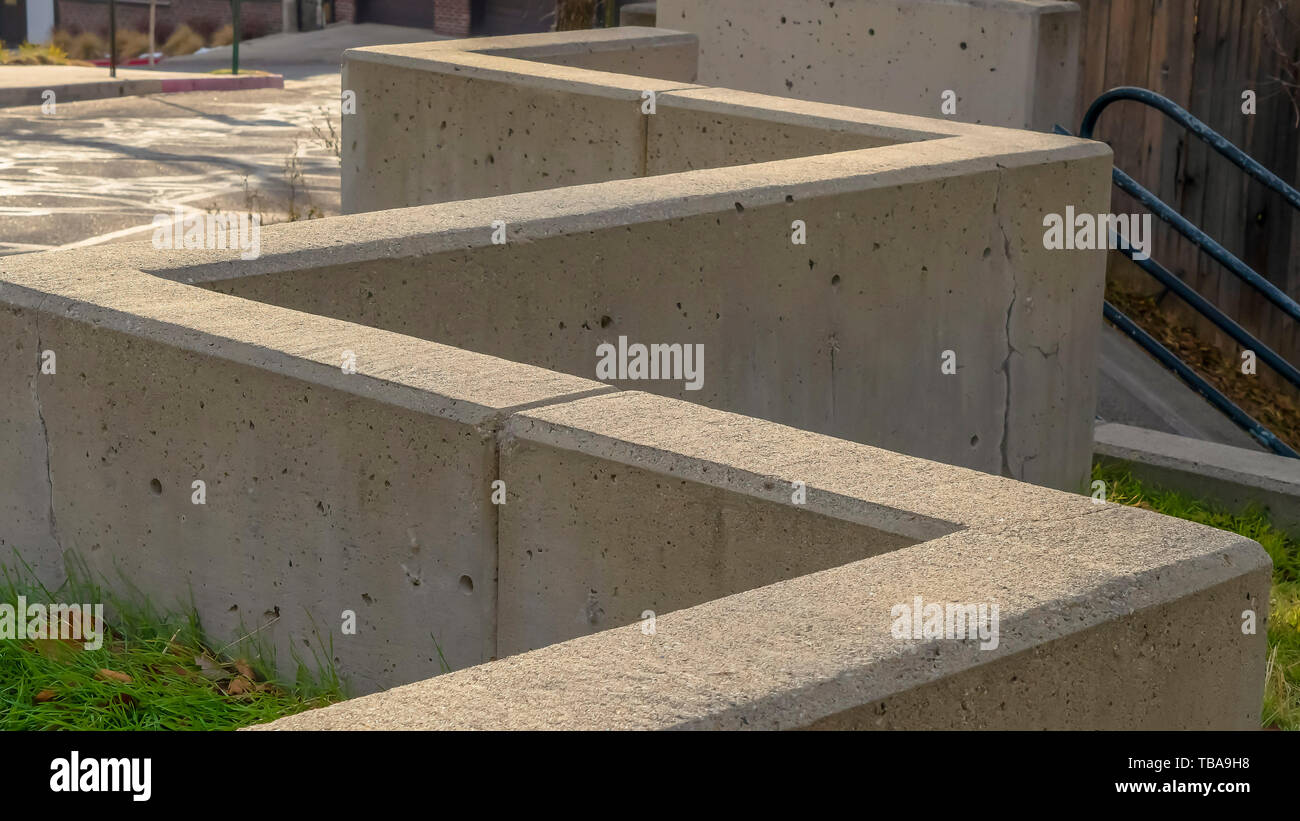 frame Panorama frame Concrete blocks on a grassy terrain at the side of ...