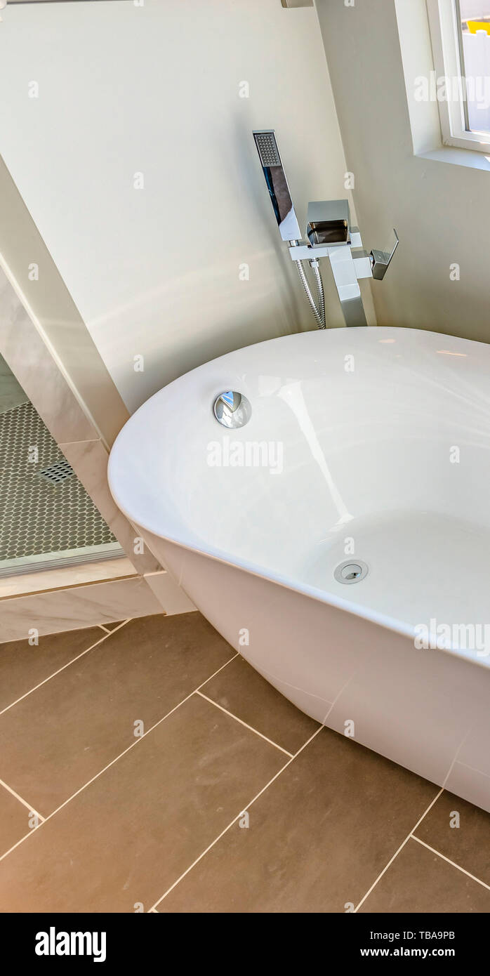 frame Vertical frame Interior of a bathroom with a smooth and glossy ...