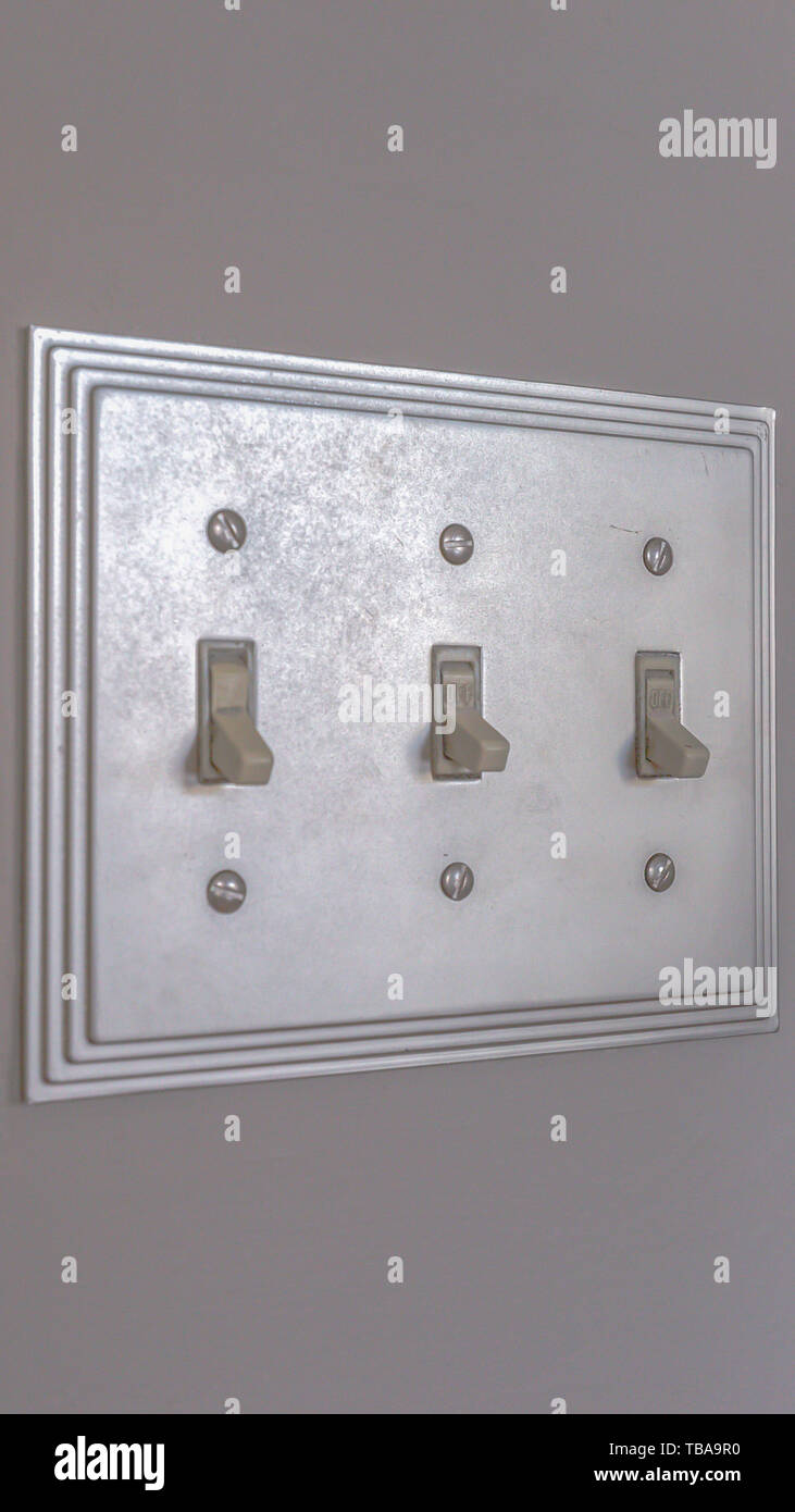 frame Vertical frame Close up of the wall mounted electrical light ...