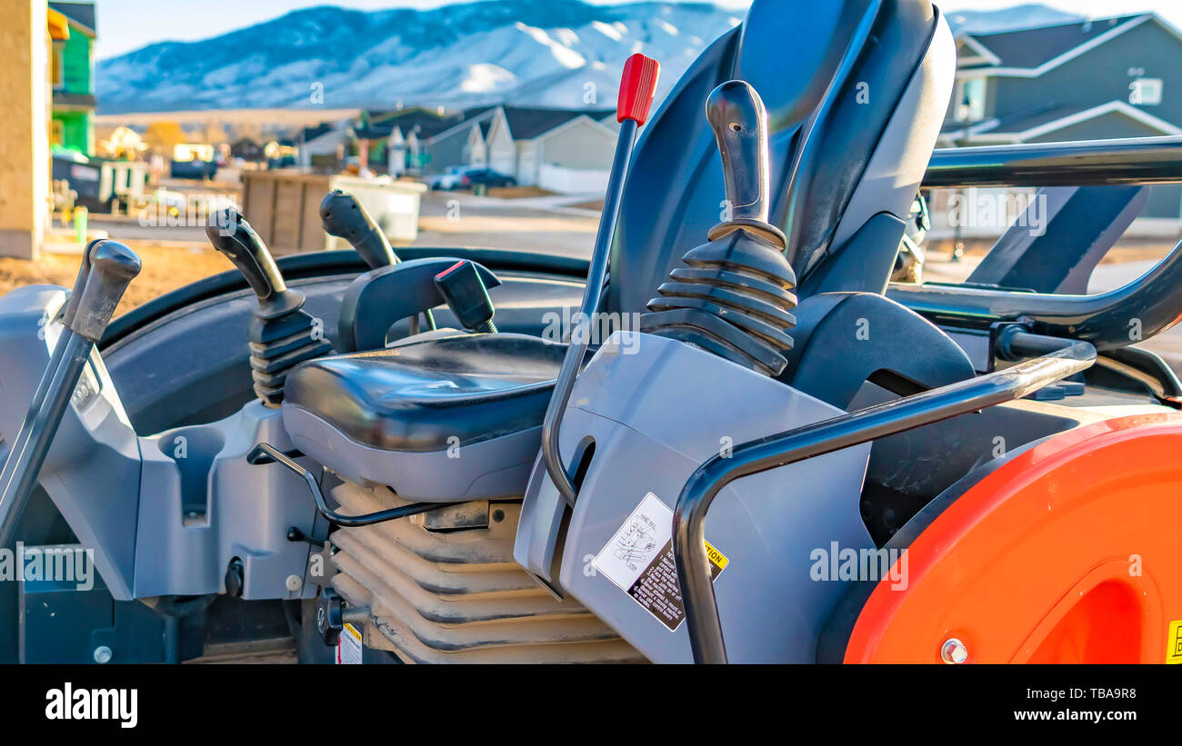 frame Panorama Interior of the open cab of a heavy duty construction ...