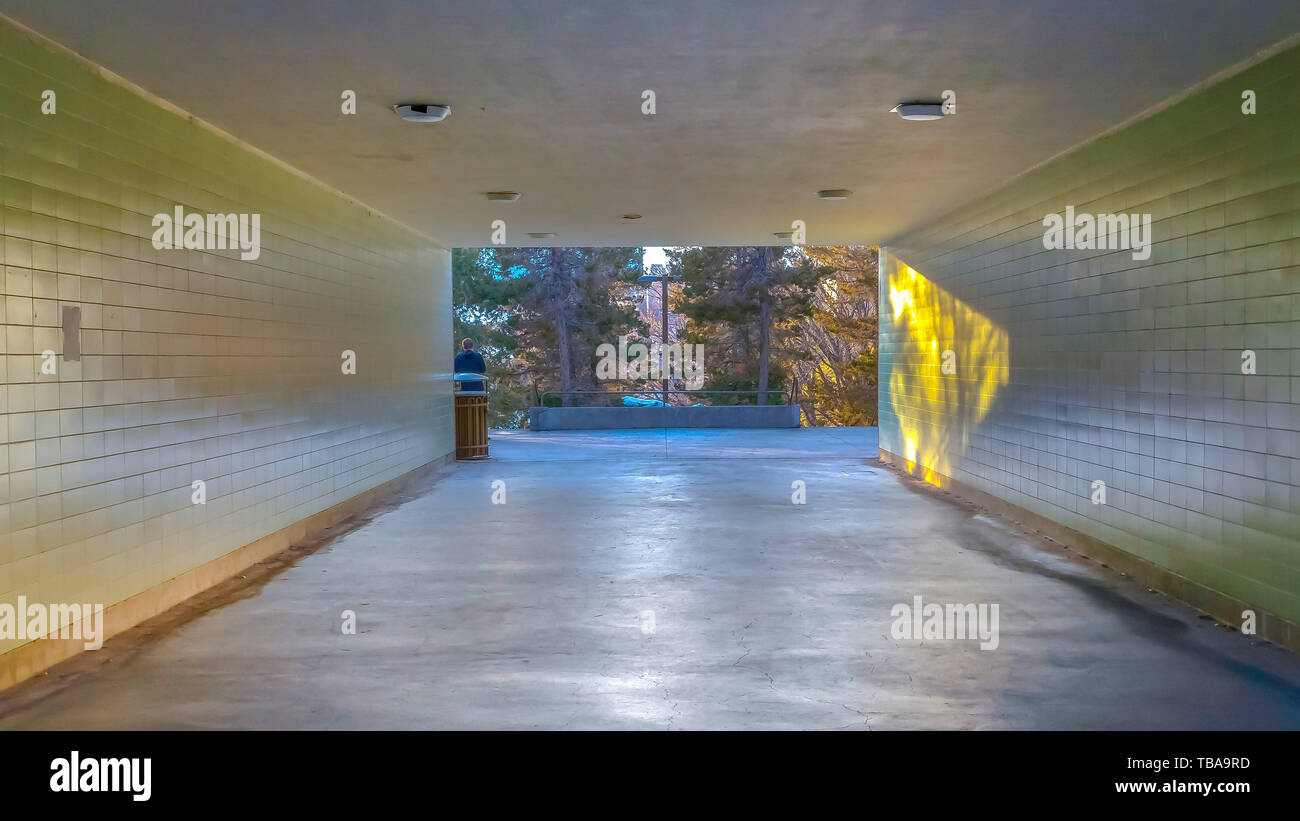 frame Panorama frame Passage way under a building with cracked floor ...
