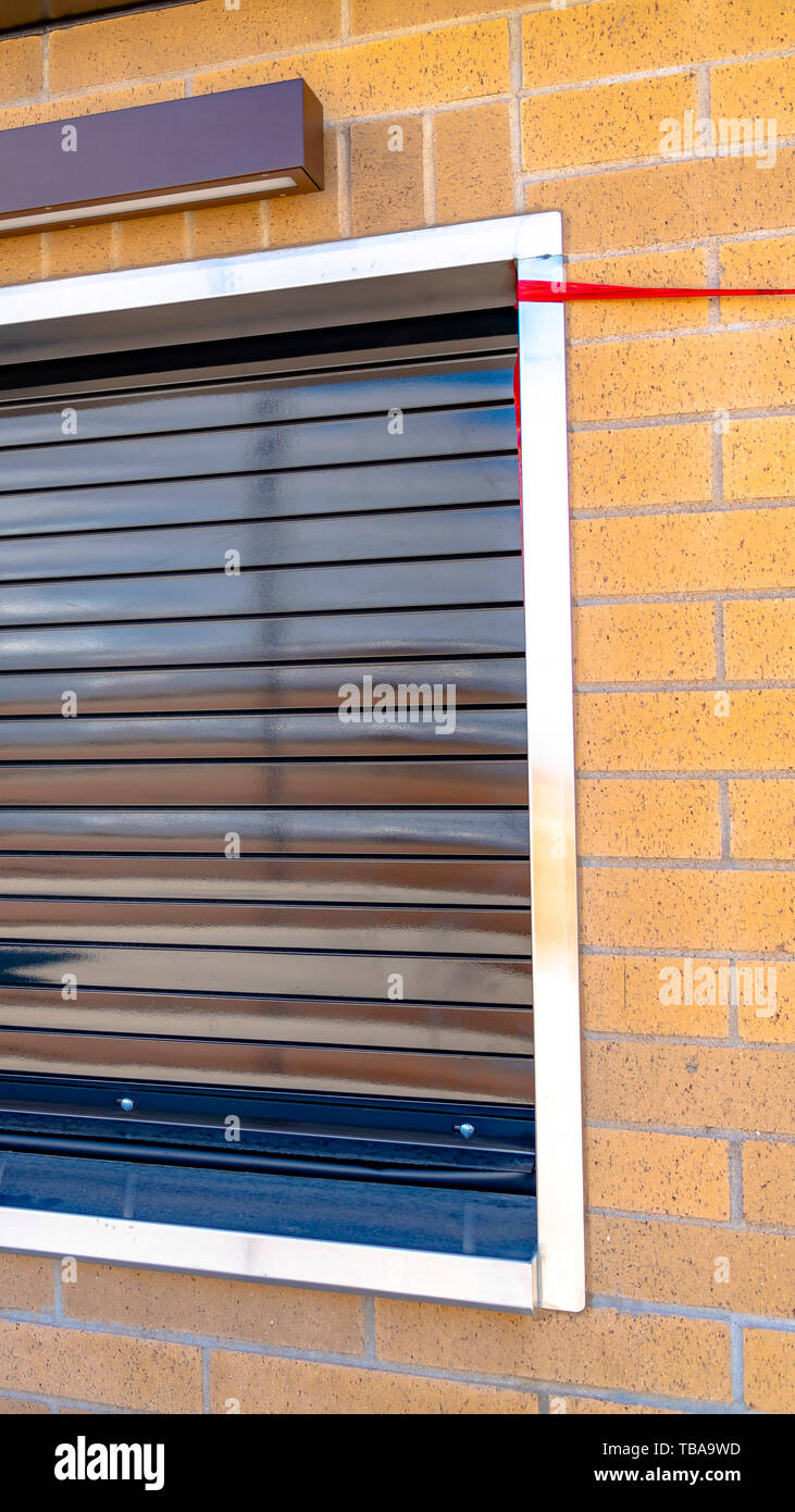 frame Vertical frame Close up of a building with glossy industrial ...