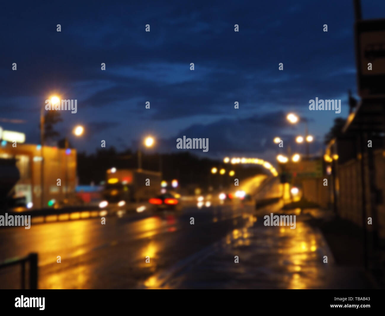 Driving on the night road Stock Photo - Alamy