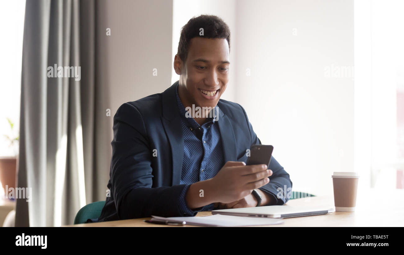 African american employee texting on hi-res stock photography and ...