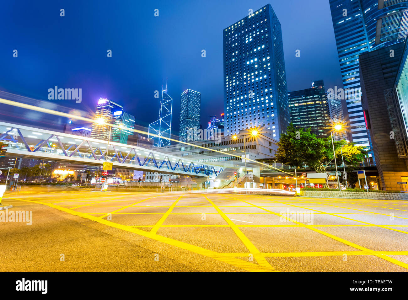 Traffic light trails in illuminated city Stock Photo - Alamy