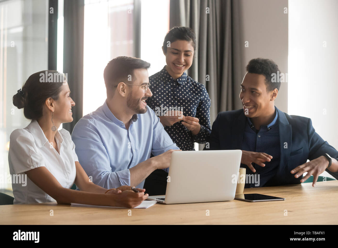 Group employees office diverse candid hi-res stock photography and ...
