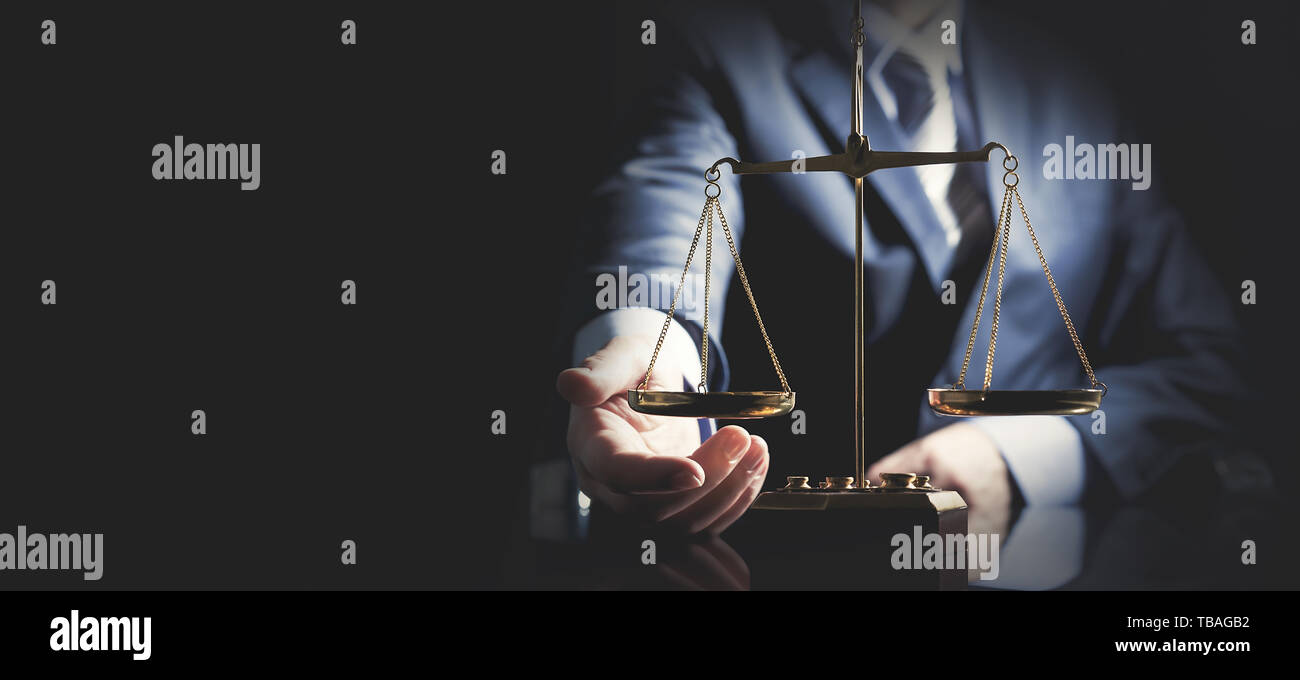 Weight scale of justice, lawyer or attorney concept. Unrecognizable ...