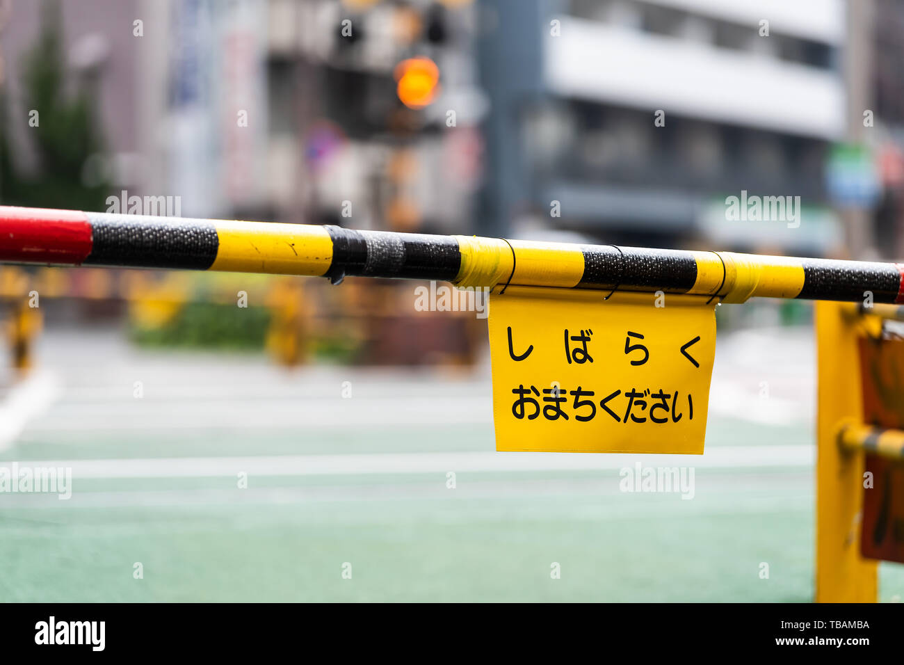 Tokyo, Japan Shibuya street sidewalk road by buildings during day with ...
