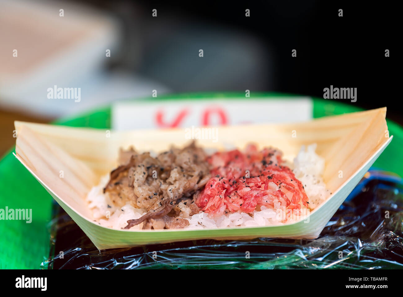 Tokyo, Japan Street in Tsukiji outer market near Ginza with closeup of ...