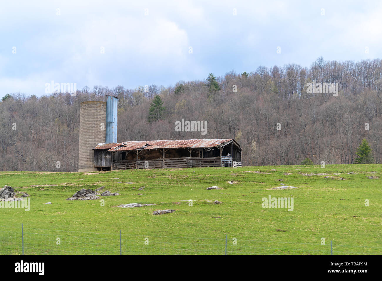 Rural Virginia scenery with farm countryside in spring and grass lawn ...