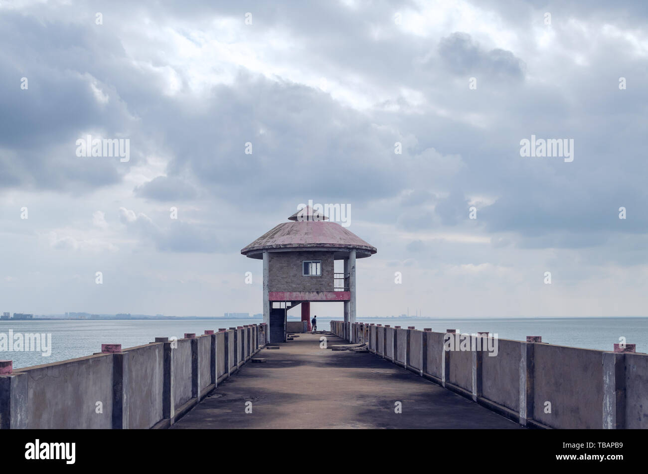 It's cloudy at the pier Stock Photo - Alamy