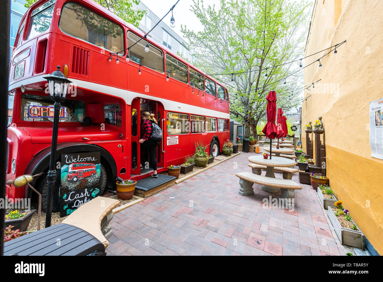 Asheville, USA - April 19, 2018: People boarding double decker d's bus ...