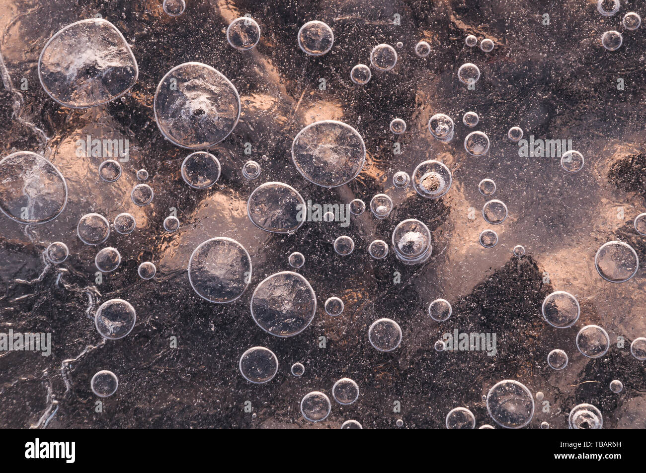 Texture abstract closeup background ice with bubbles of air caught by ...